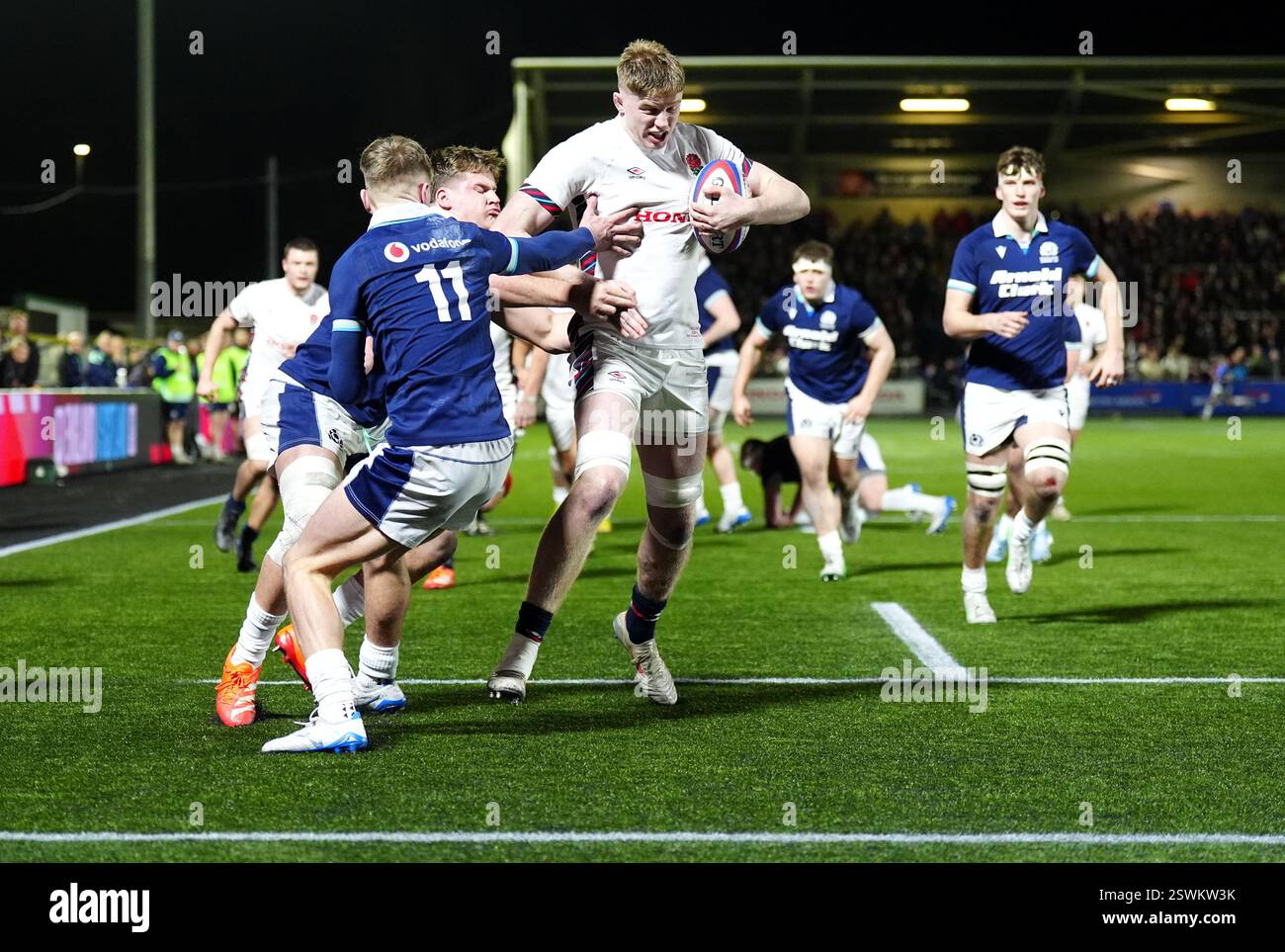 England's Tom Burrow goes on to score their side's sixth try of the ...