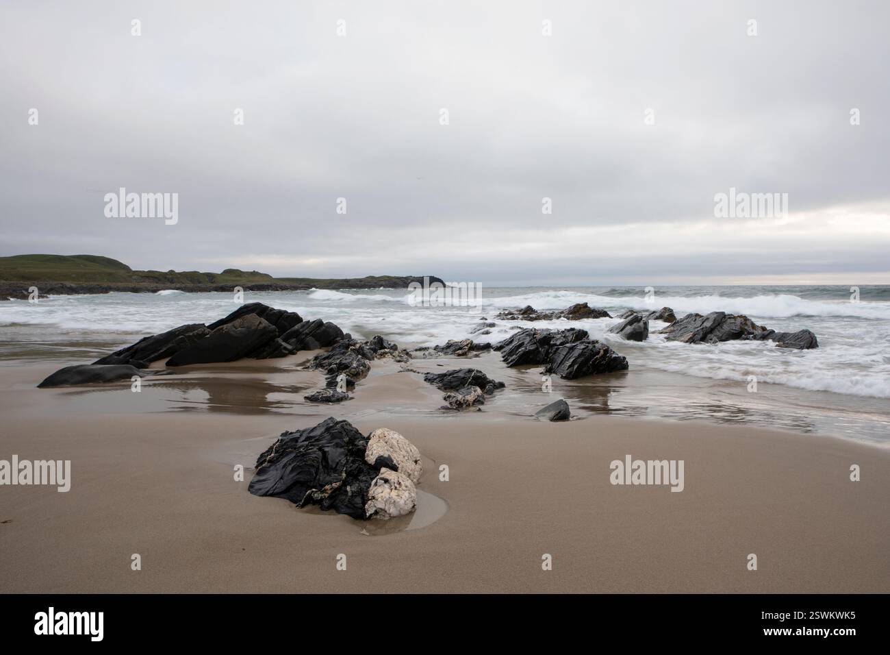 Rock formations along the beach at Saligo Bay in Isle of Islay Stock ...