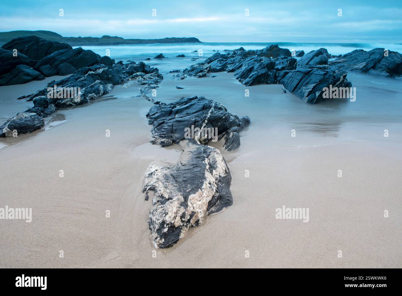 Rock formations along the beach at Saligo Bay in Isle of Islay Stock ...