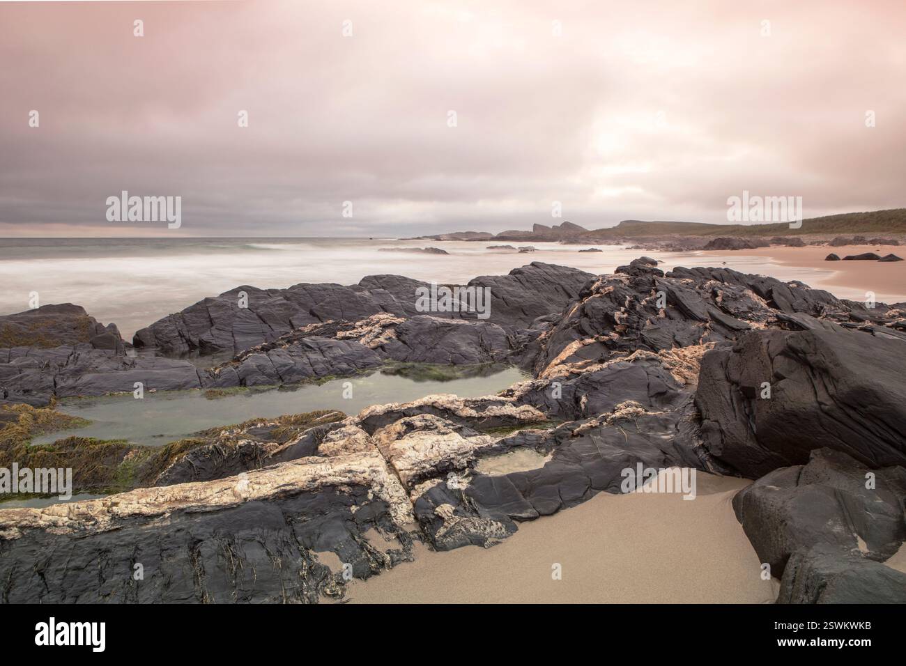 Rock formations along the beach at Saligo Bay in Isle of Islay Stock ...