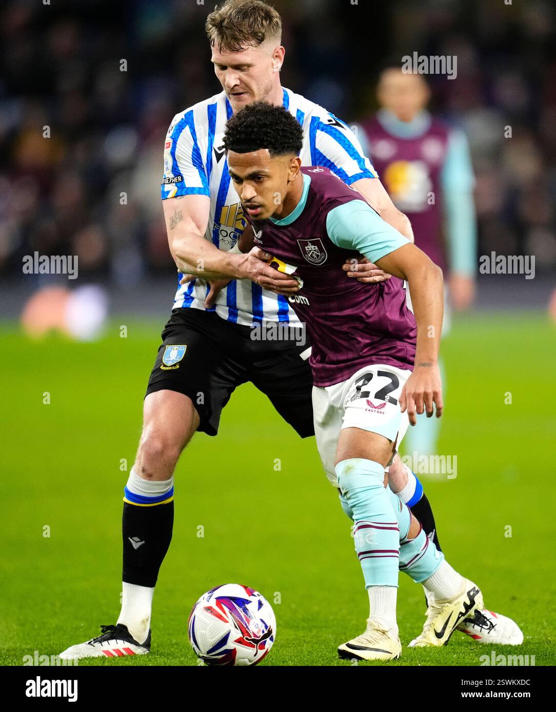 Sheffield Wednesday's Michael Smith and Burnley's Marcus Edwards battle ...