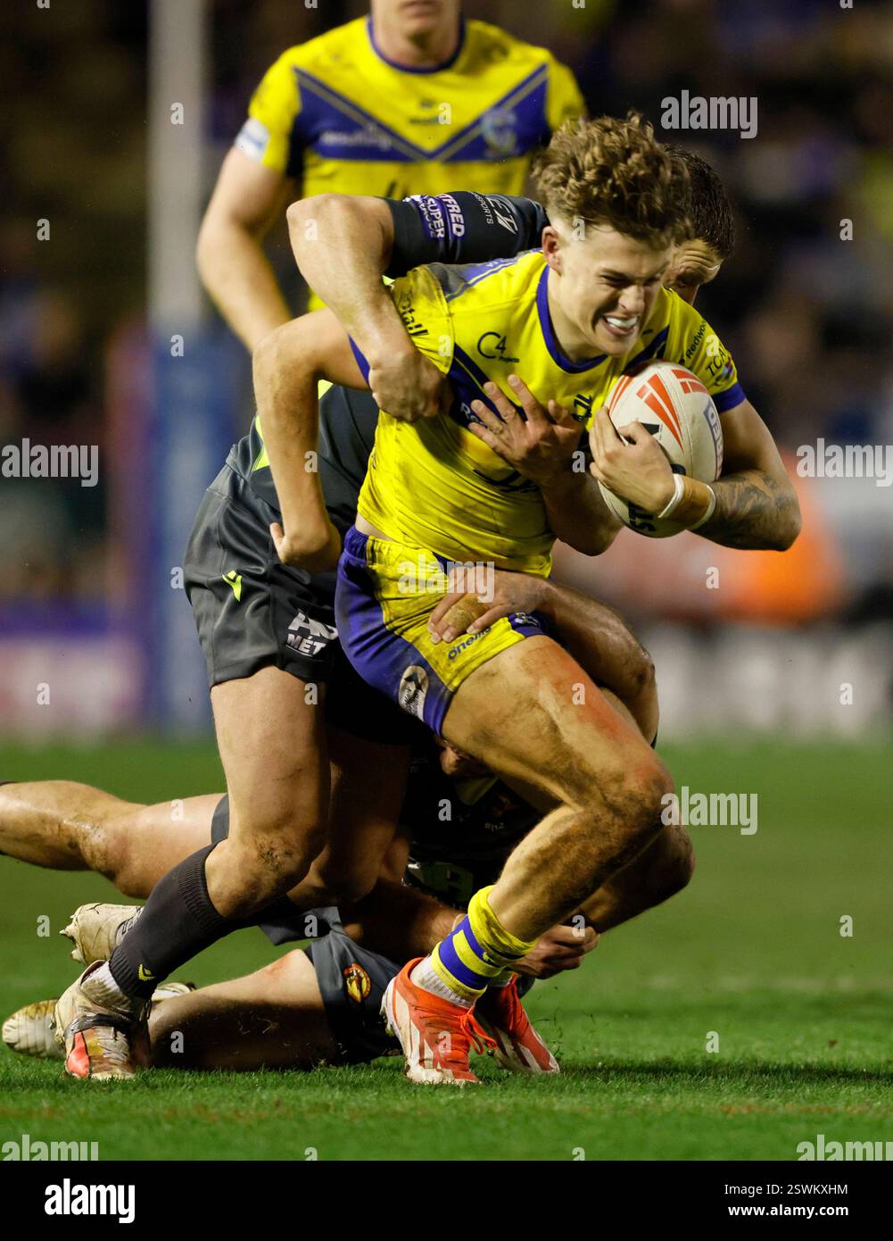 Warrington Wolves' Arron Lindop gets tackled during the Betfred Super ...