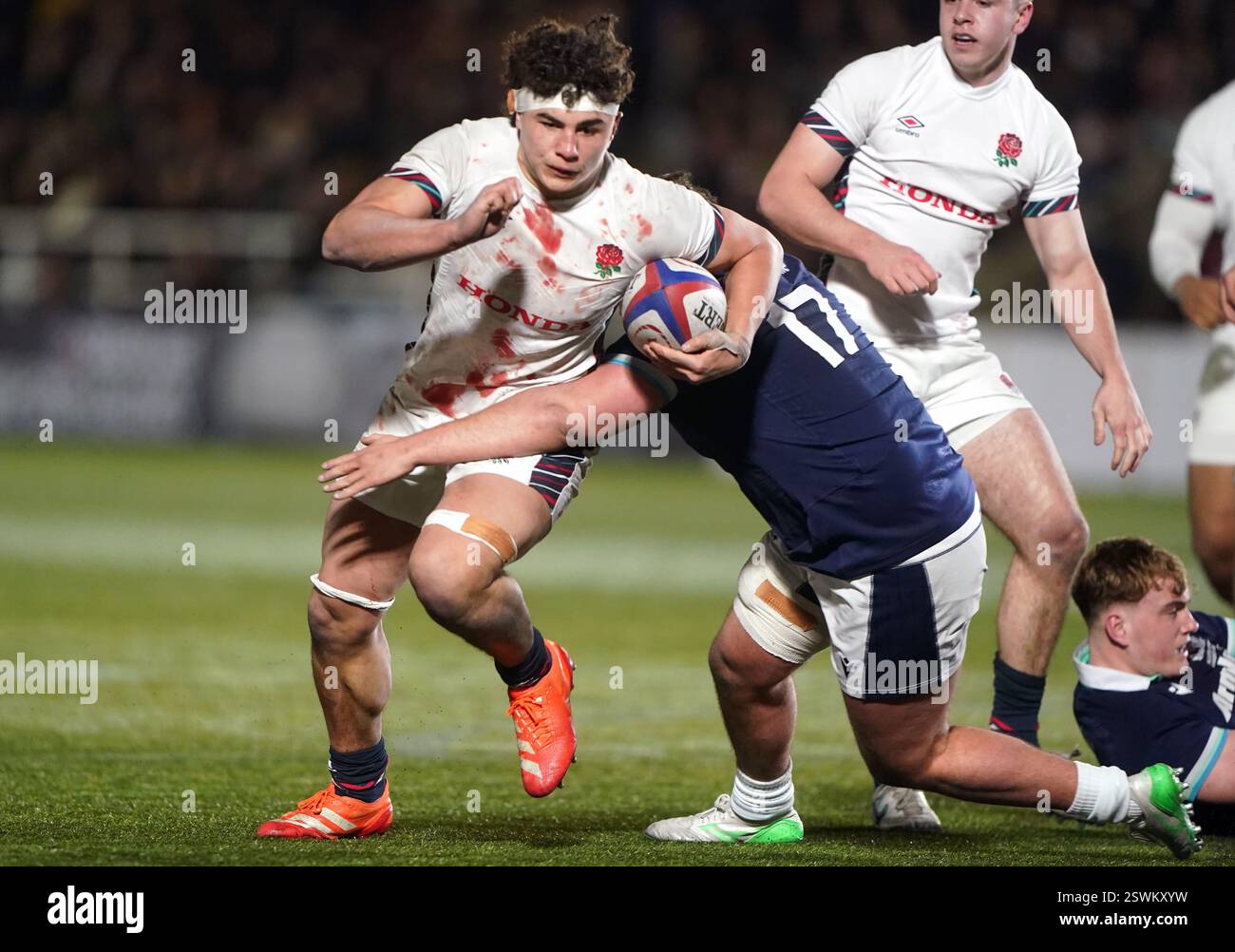 England's Kane James and Scotland's Oliver McKenna during the U20 Six ...