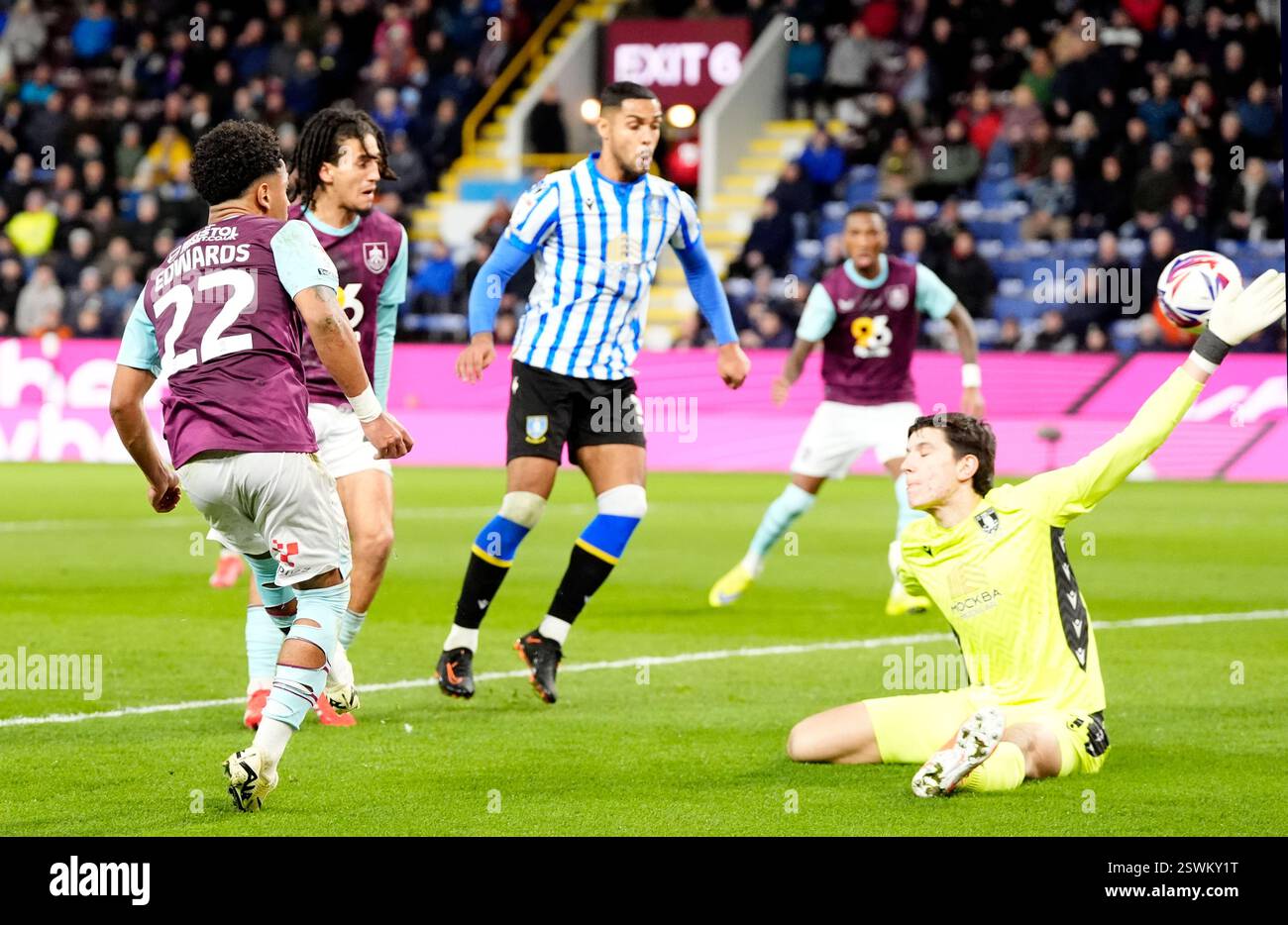 Burnley's Marcus Edwards scores their side's first goal of the game ...