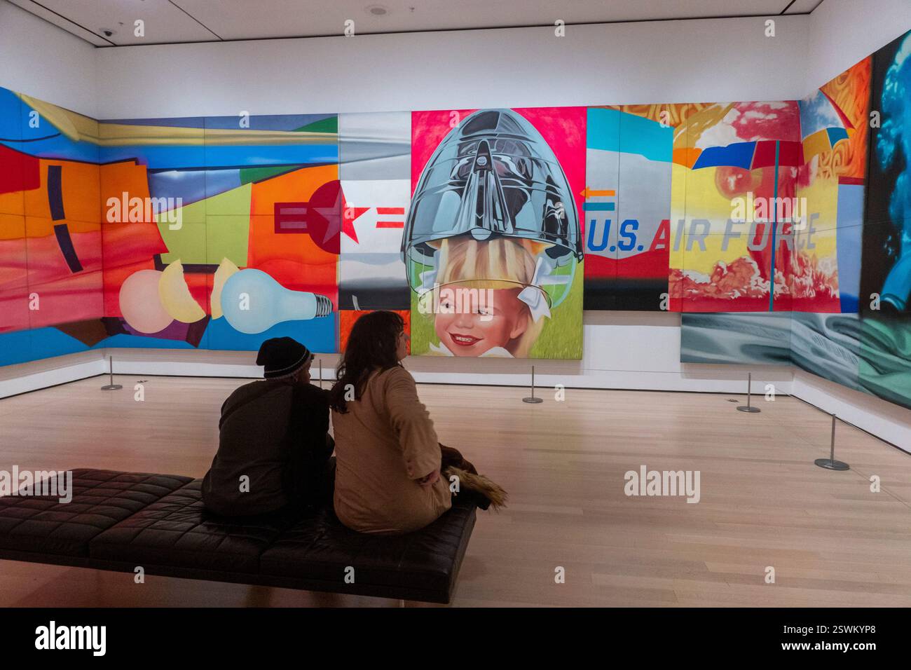 spectators looking at James Rosenquist, F-111, Oil on canvas with ...