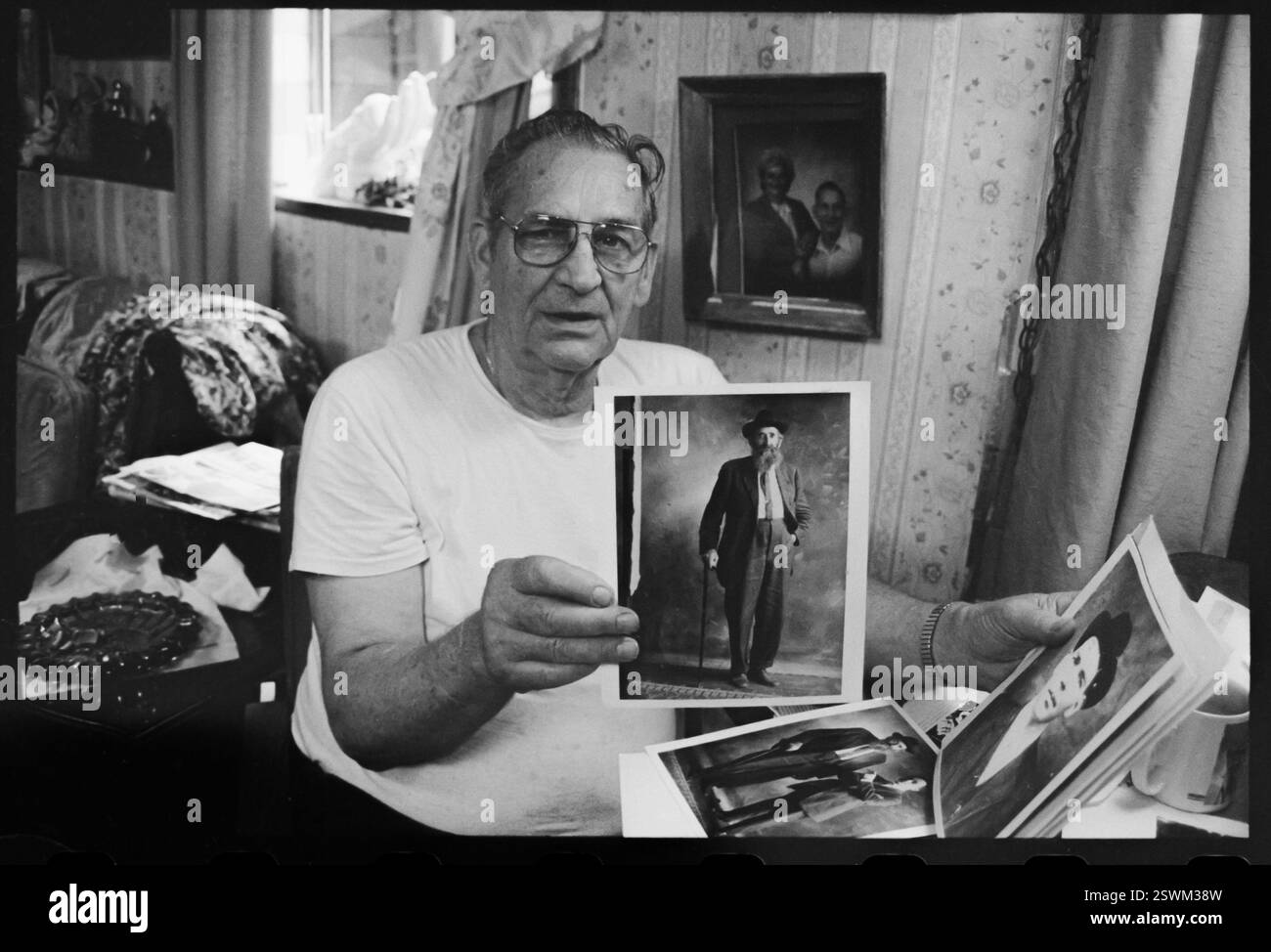 The grandson of Devil Anse Hatfield shows photos of his ancestor in his ...