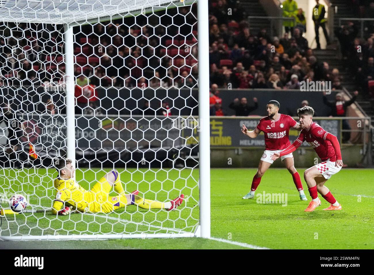 Bristol City's George Earthy (right) scores their side's second goal of ...