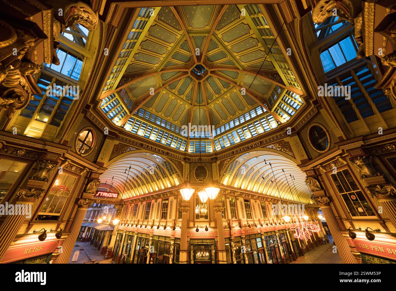 Inside Leadenhall Market, London. Ornate, domed ceiling, shops, and ...