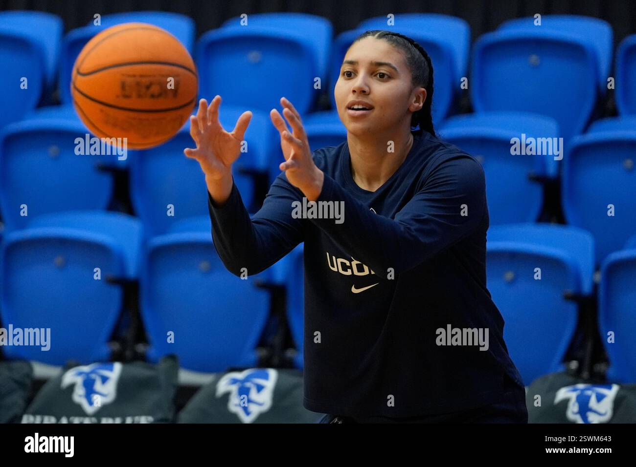 UConn's Azzi Fudd warms up before an NCAA college basketball game ...