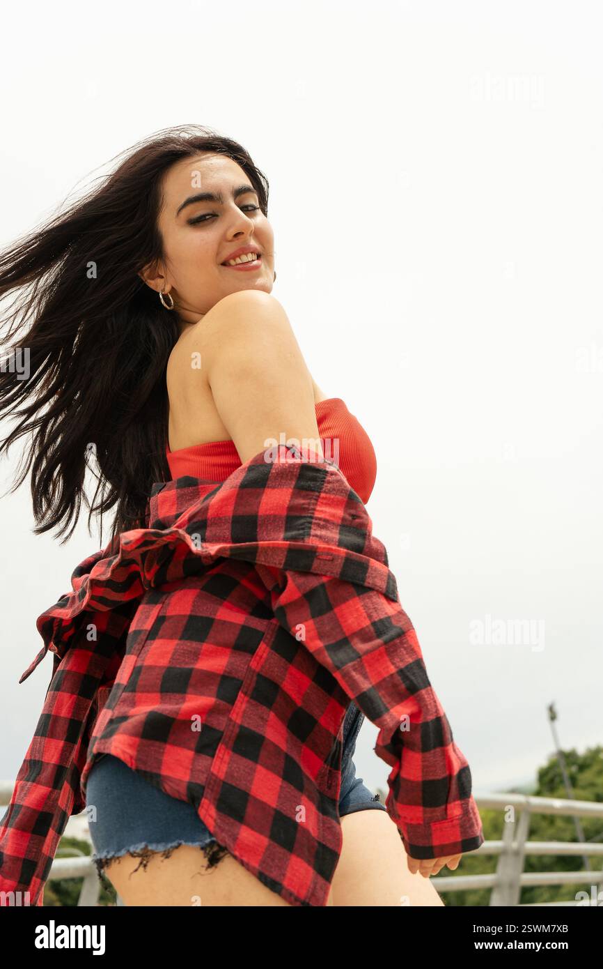 Casual woman wearing plaid hi-res stock photography and images - Alamy