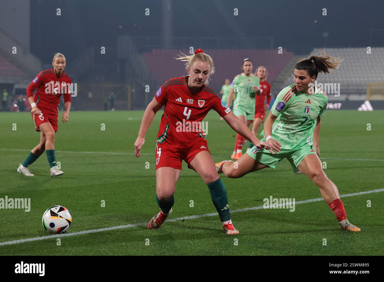 Monza, Italy. 21st Feb, 2025. Mayzee Davies of Wales shields the ball ...