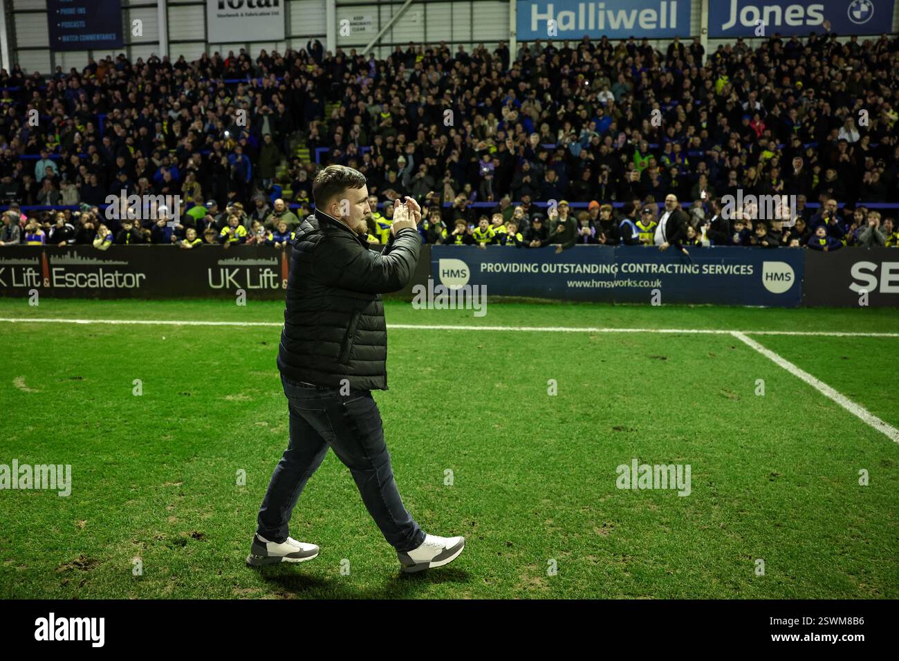 Luke Littler applauds the crowd during the Betfred Super League Round 2 ...