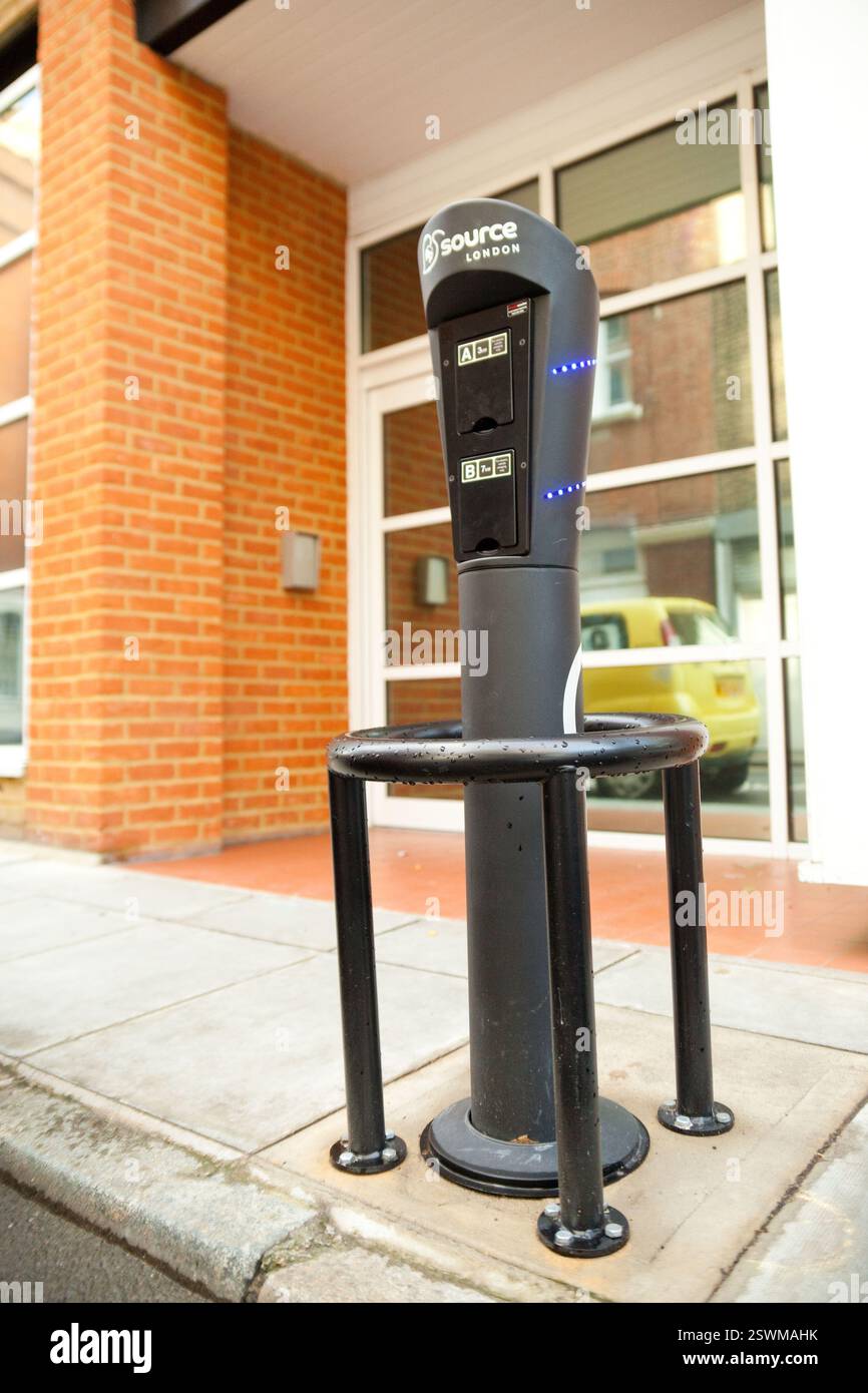 Electric vehicle charging station (g-source London) on the pavement ...