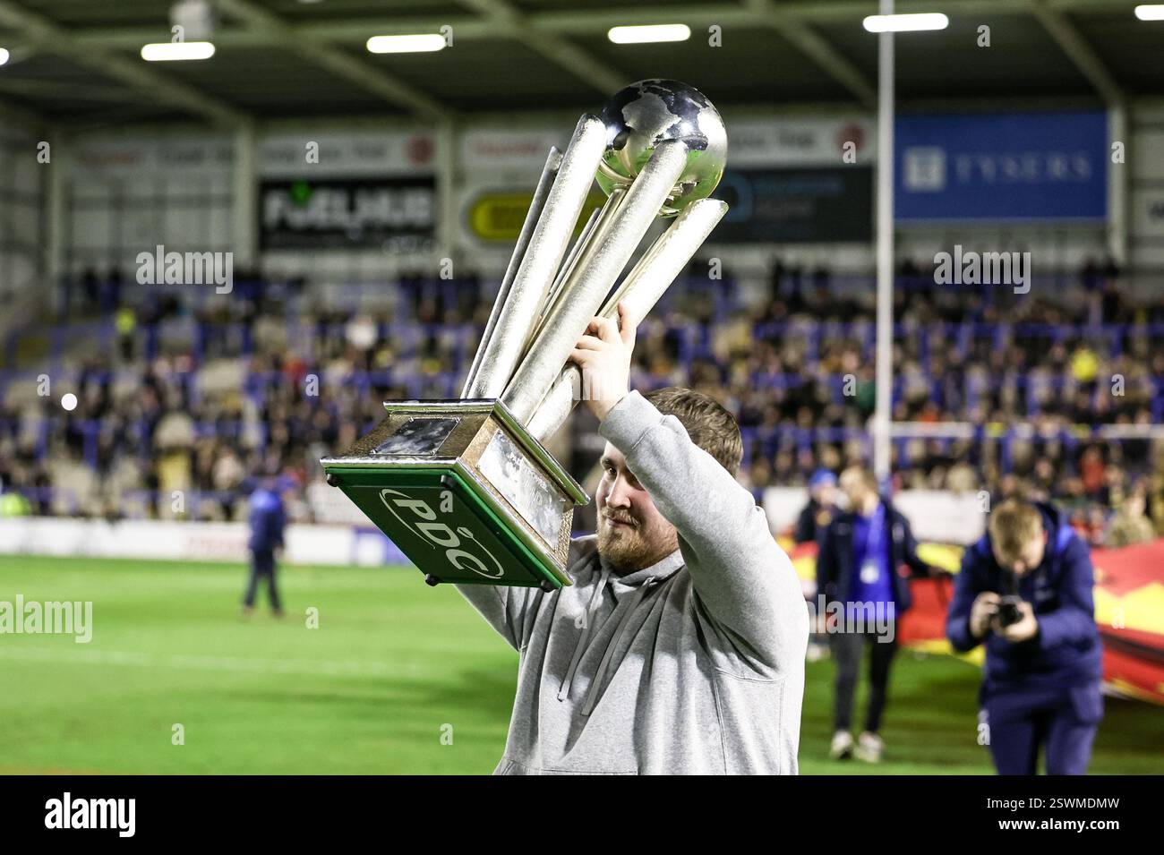 Luke Littler with the Sid Waddell Trophy during the Betfred Super ...