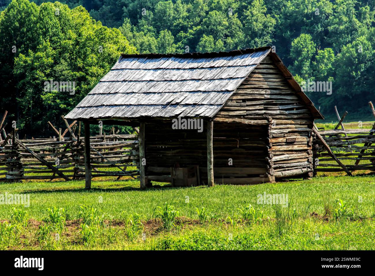 Small wooden building with a slanted roof. The roof is made of wood ...