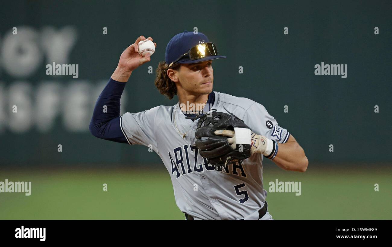 Arizona infielder Mathis Meurant (5) throws during warm ups before an ...