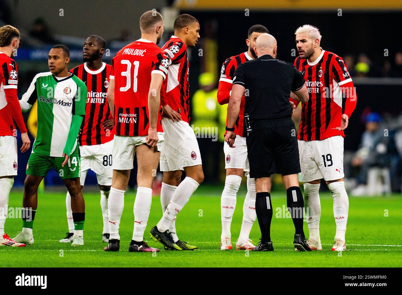 Milan, Italy. 18th Feb, 2025. Milan - Igor Paixao of Feyenoord, Yunus Musah of AC Milan, Malick ...