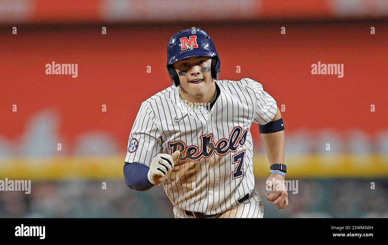 Ole Miss' Luke Hill (7) runs to third during an NCAA baseball game ...