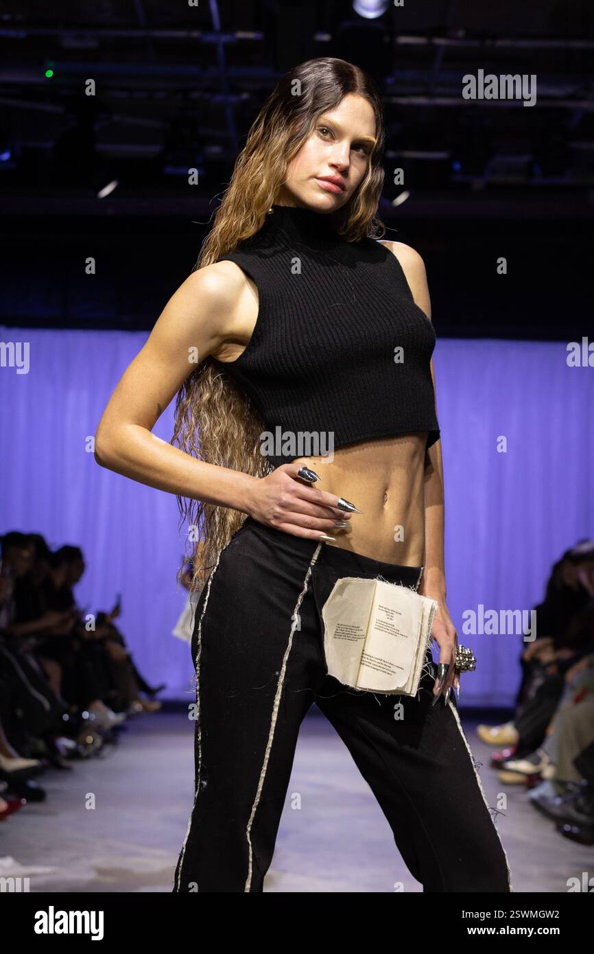 London, UK. Friday February 21, 2025. Models on the catwalk at the Di ...