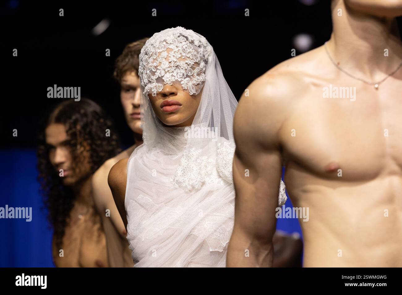 London, UK. Friday February 21, 2025. Models on the catwalk at the Di ...
