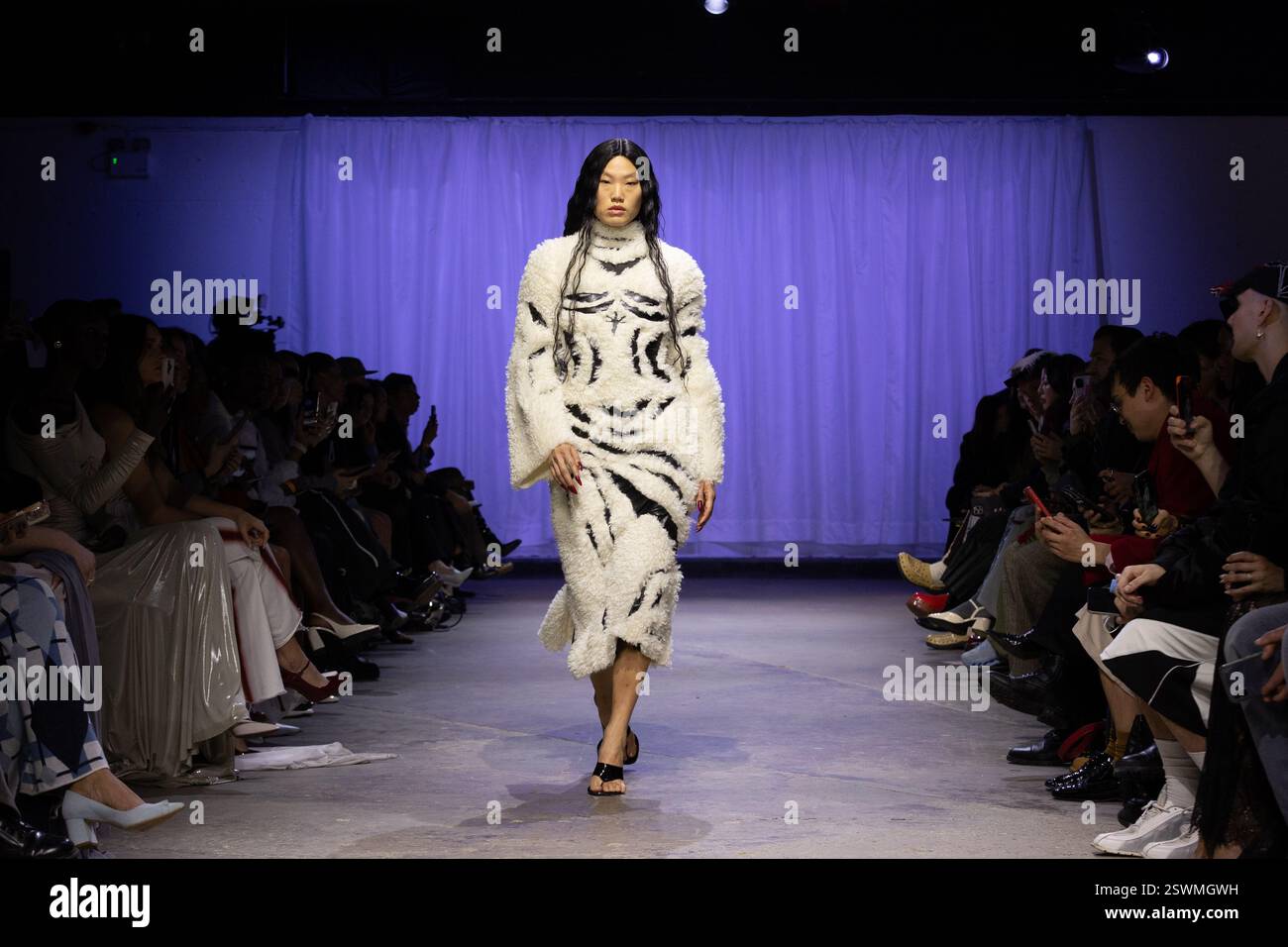 London, UK. Friday February 21, 2025. Models on the catwalk at the Di ...