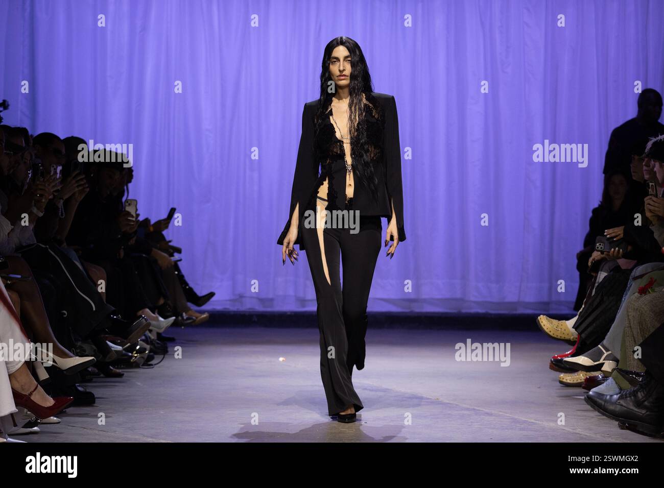 London, UK. Friday February 21, 2025. Models on the catwalk at the Di ...