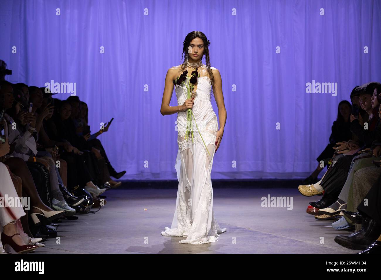 London, UK. Friday February 21, 2025. Models on the catwalk at the Di ...