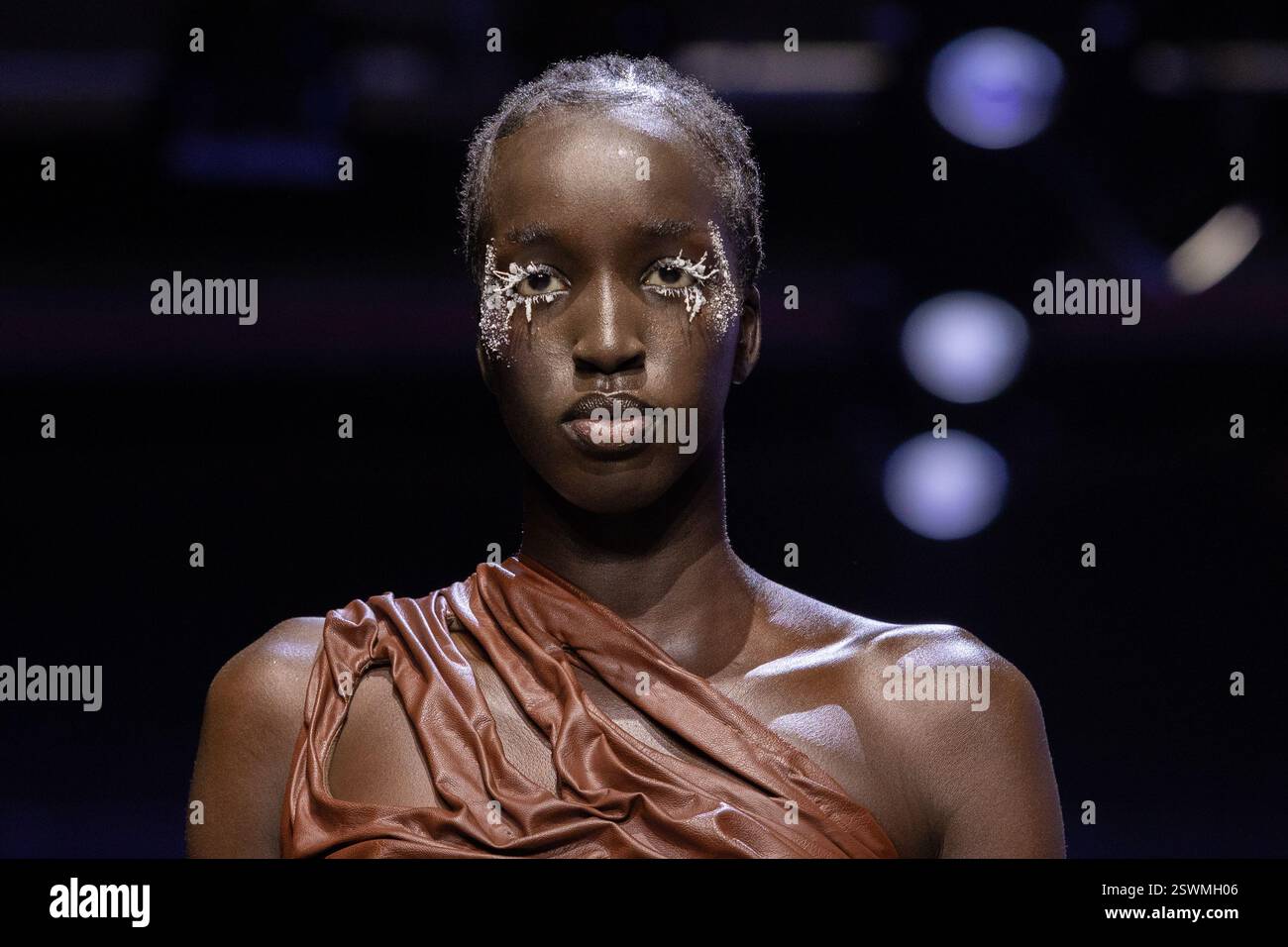 London, UK. Friday February 21, 2025. Models on the catwalk at the Di ...