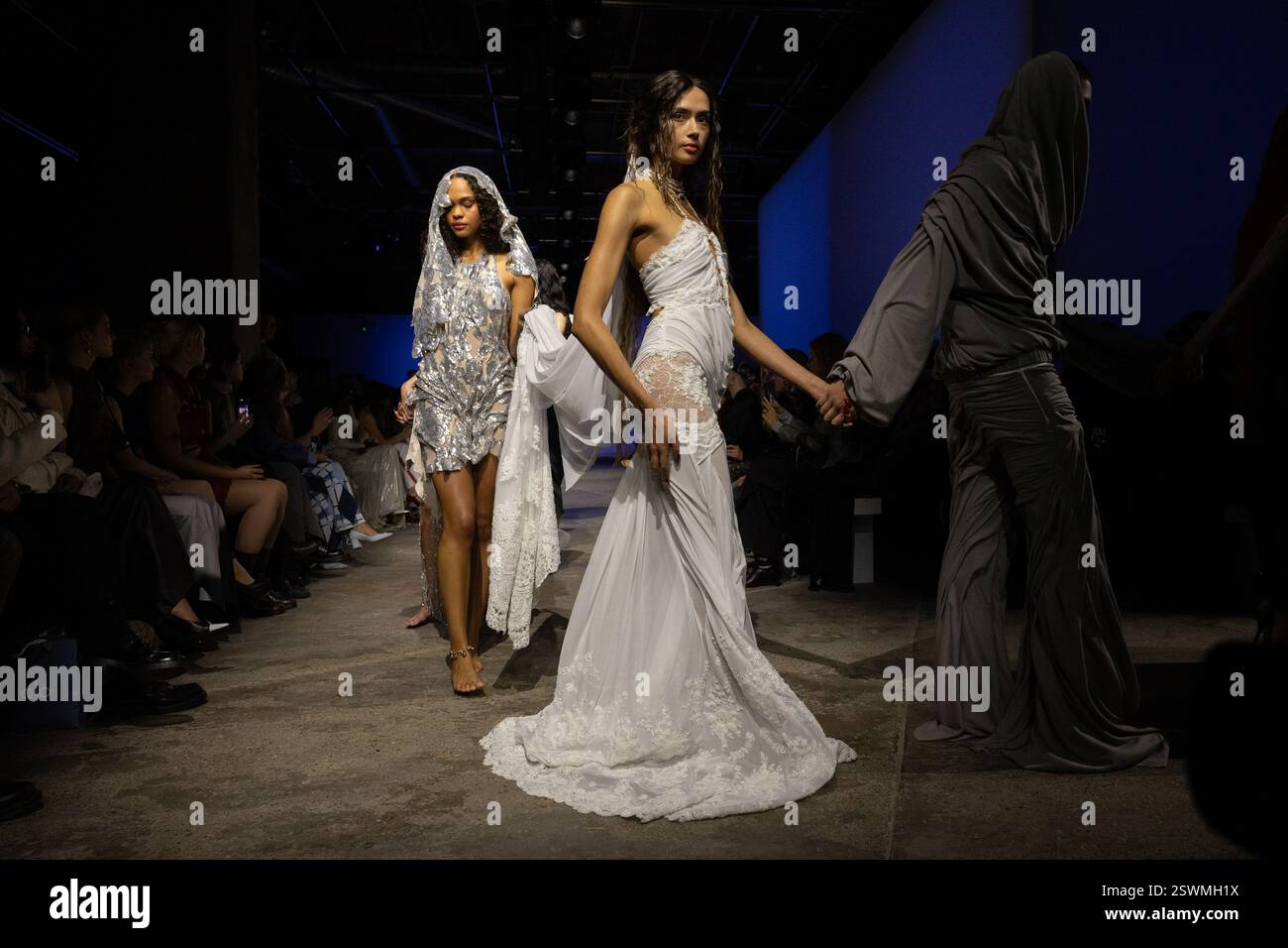 London, UK. Friday February 21, 2025. Models on the catwalk at the Di ...
