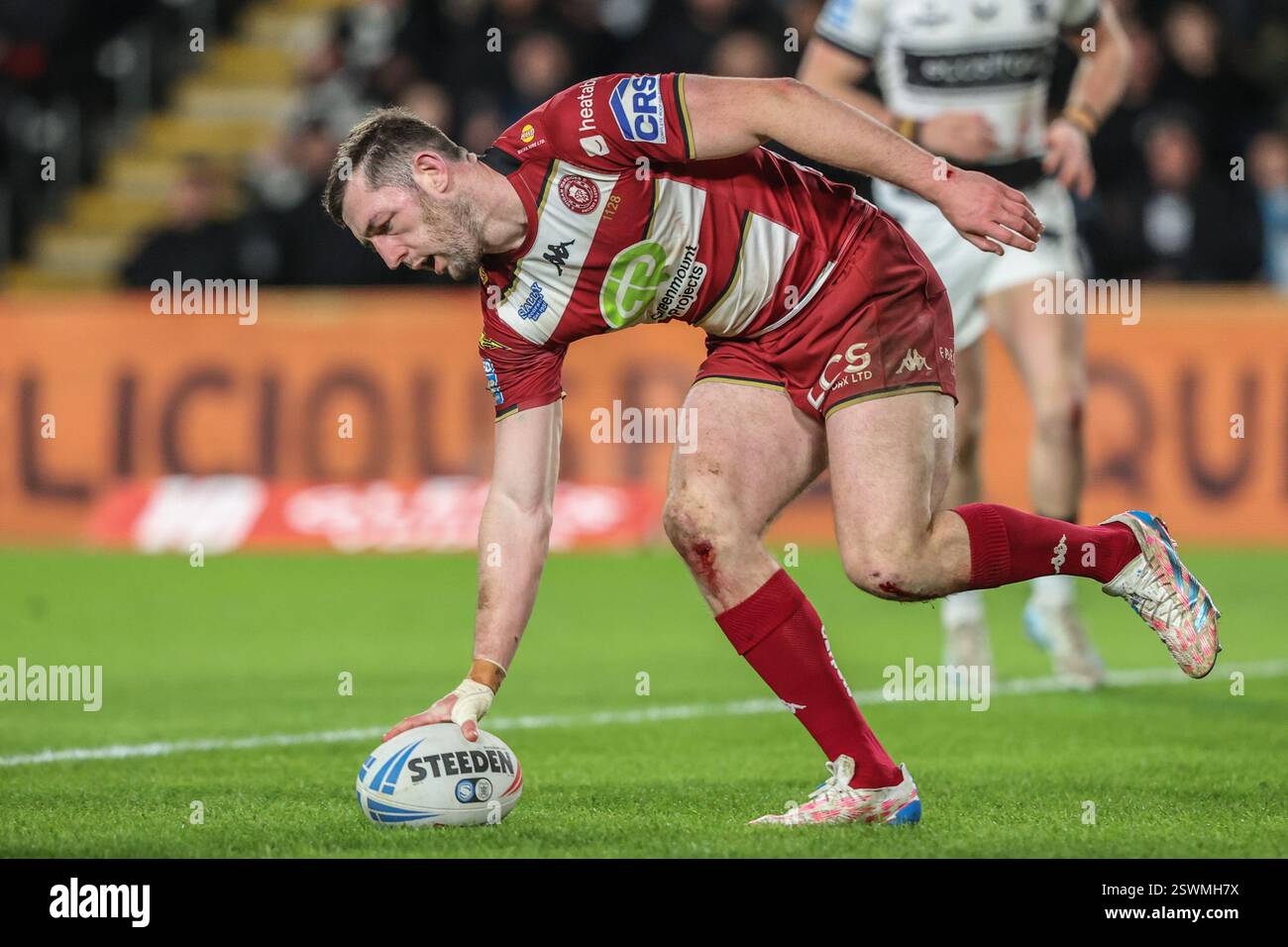 Jake Wardle of Wigan Warriors goes over for a try during the Betfred ...