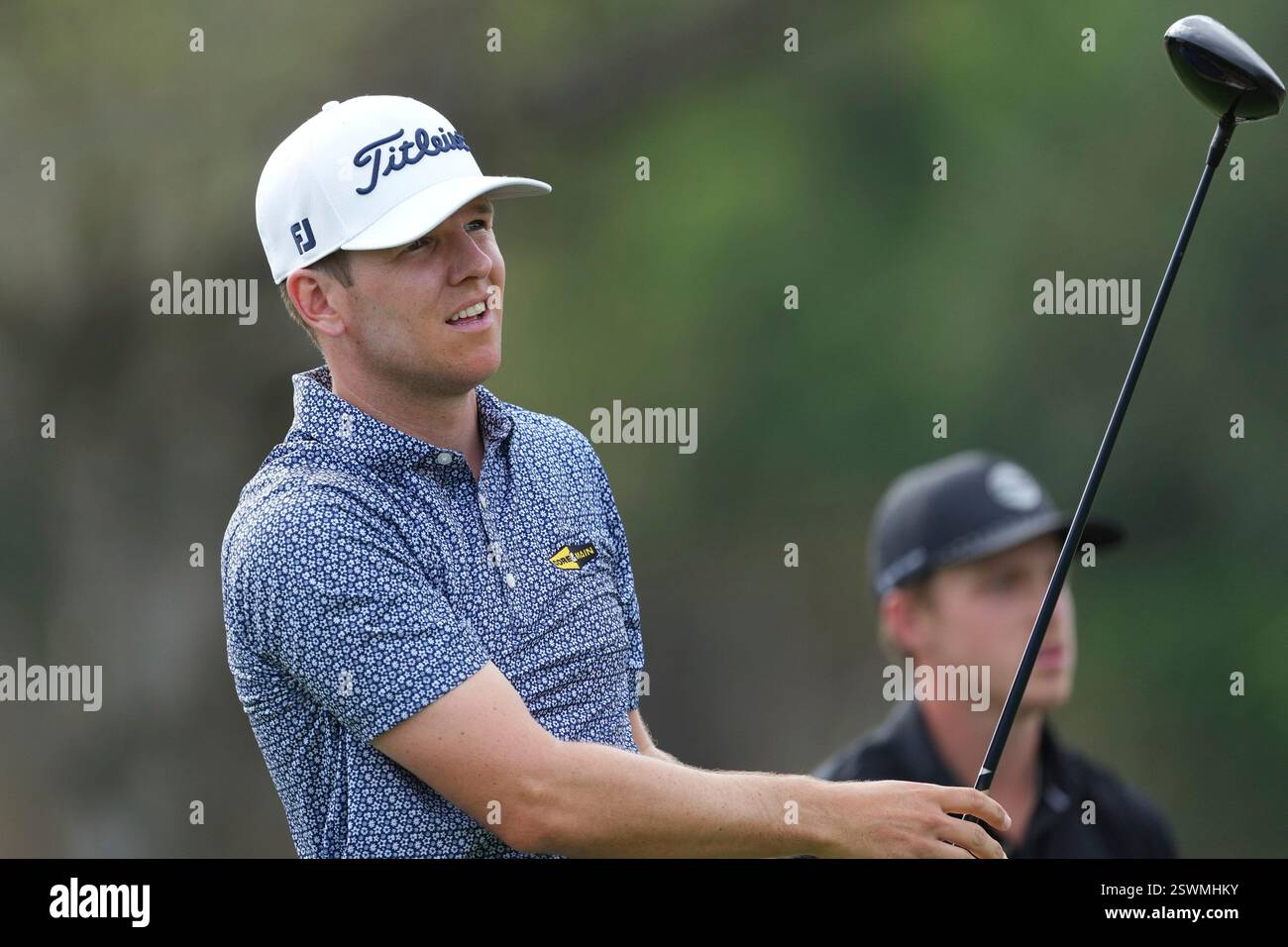 Jeremy Paul, of Germany, watches his tee shot on the second hole during ...