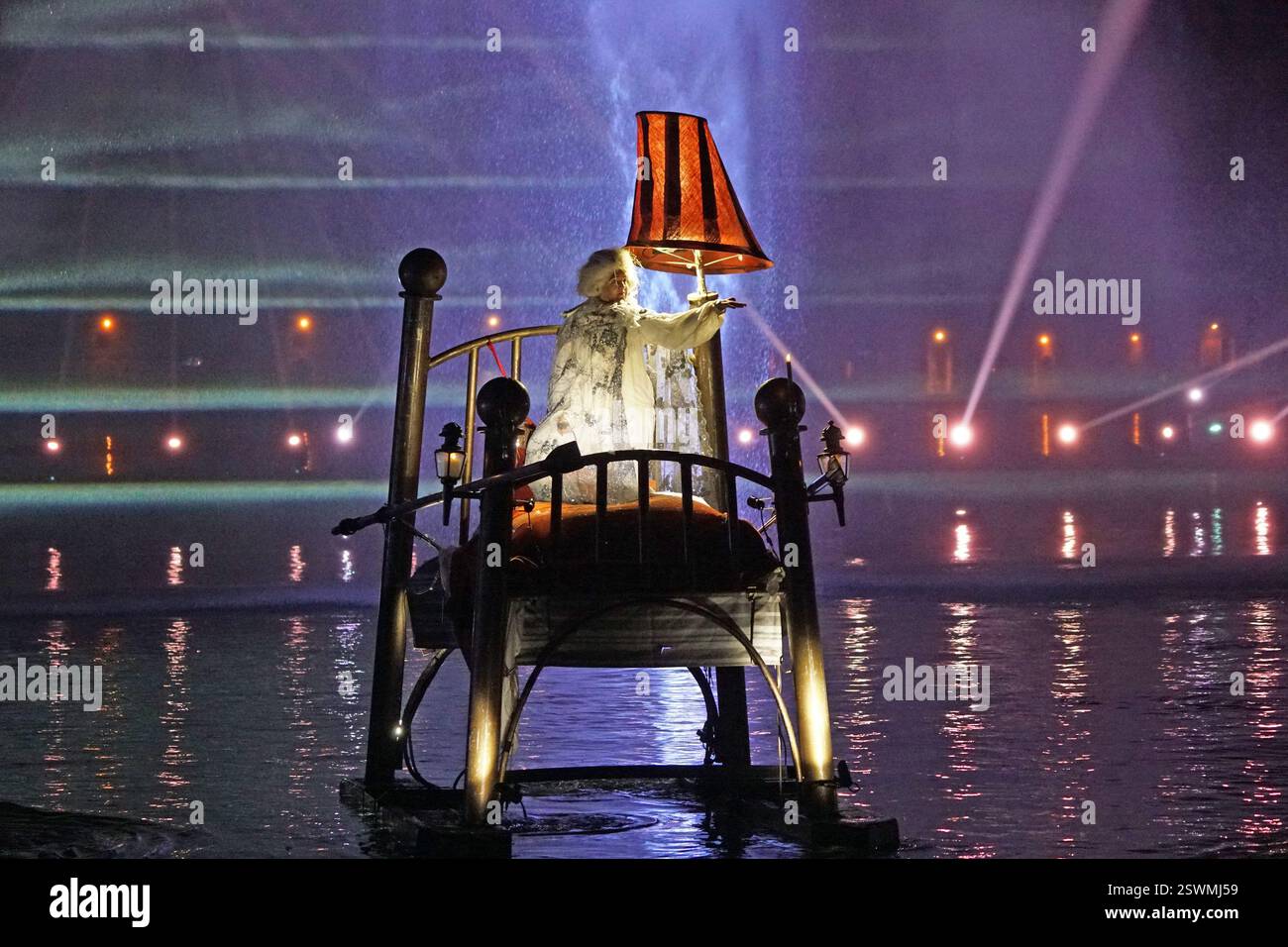 Cast members perform in a show on water titled 'Giacomo. A love story ...