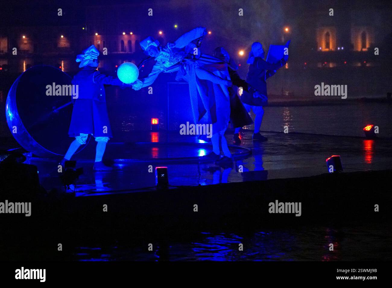 Cast members perform in a show on water titled 'Giacomo. A love story ...