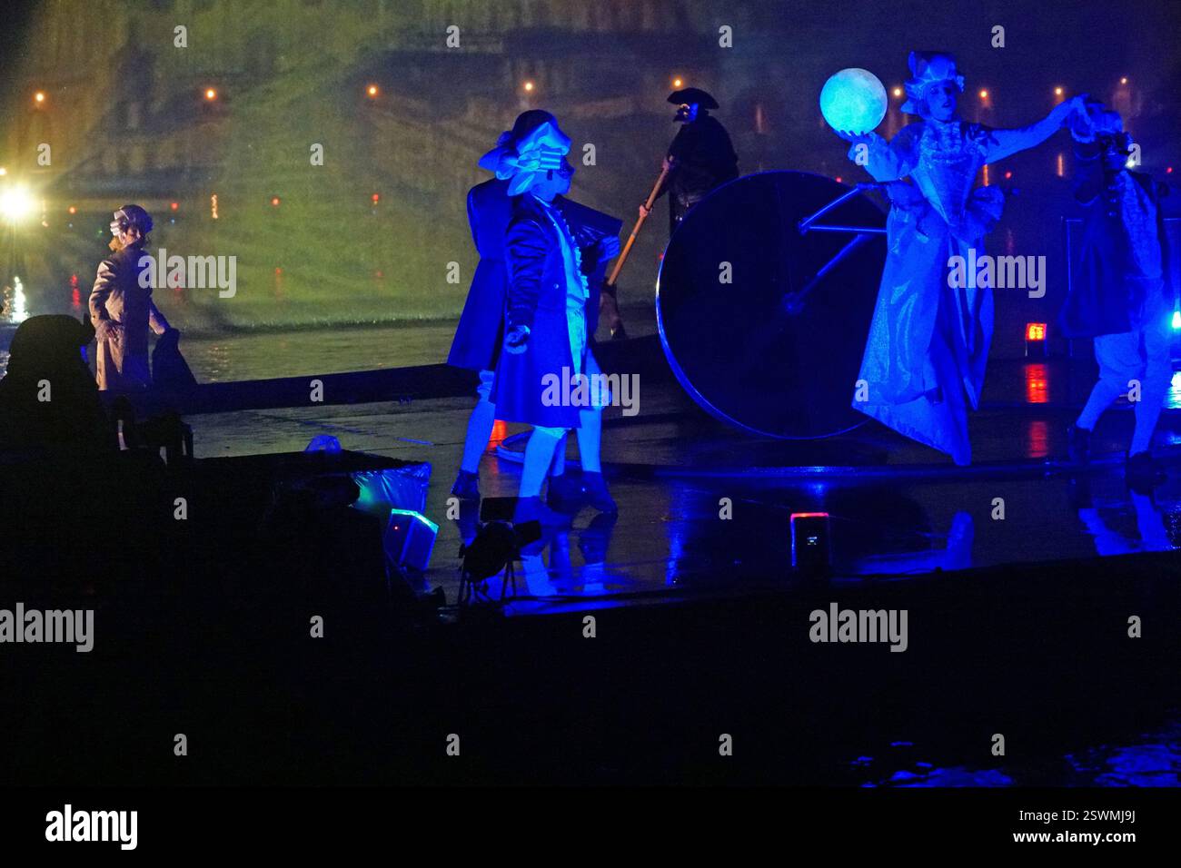 Cast members perform in a show on water titled 'Giacomo. A love story ...