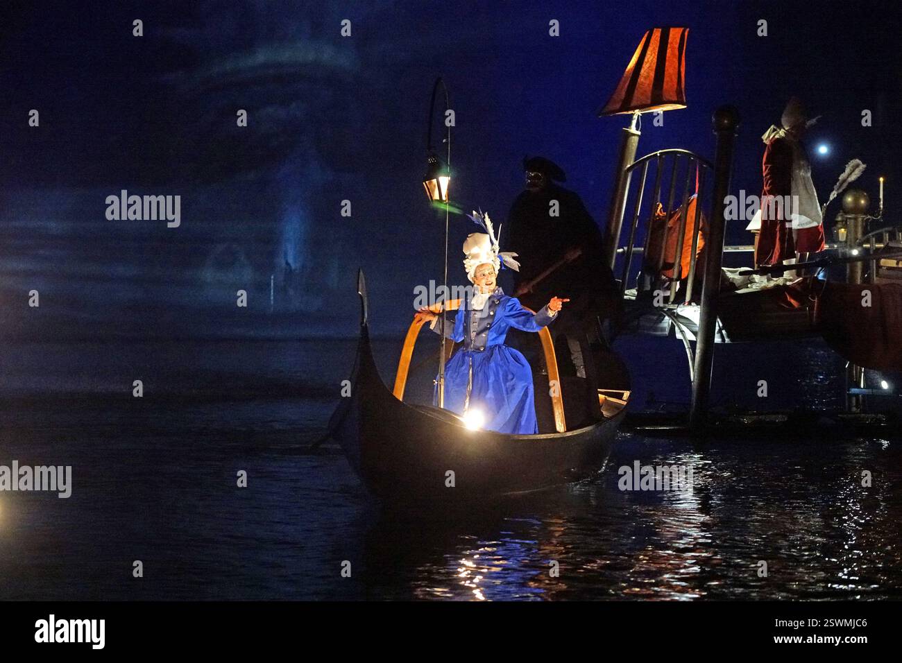 Cast members perform in a show on water titled 'Giacomo. A love story ...