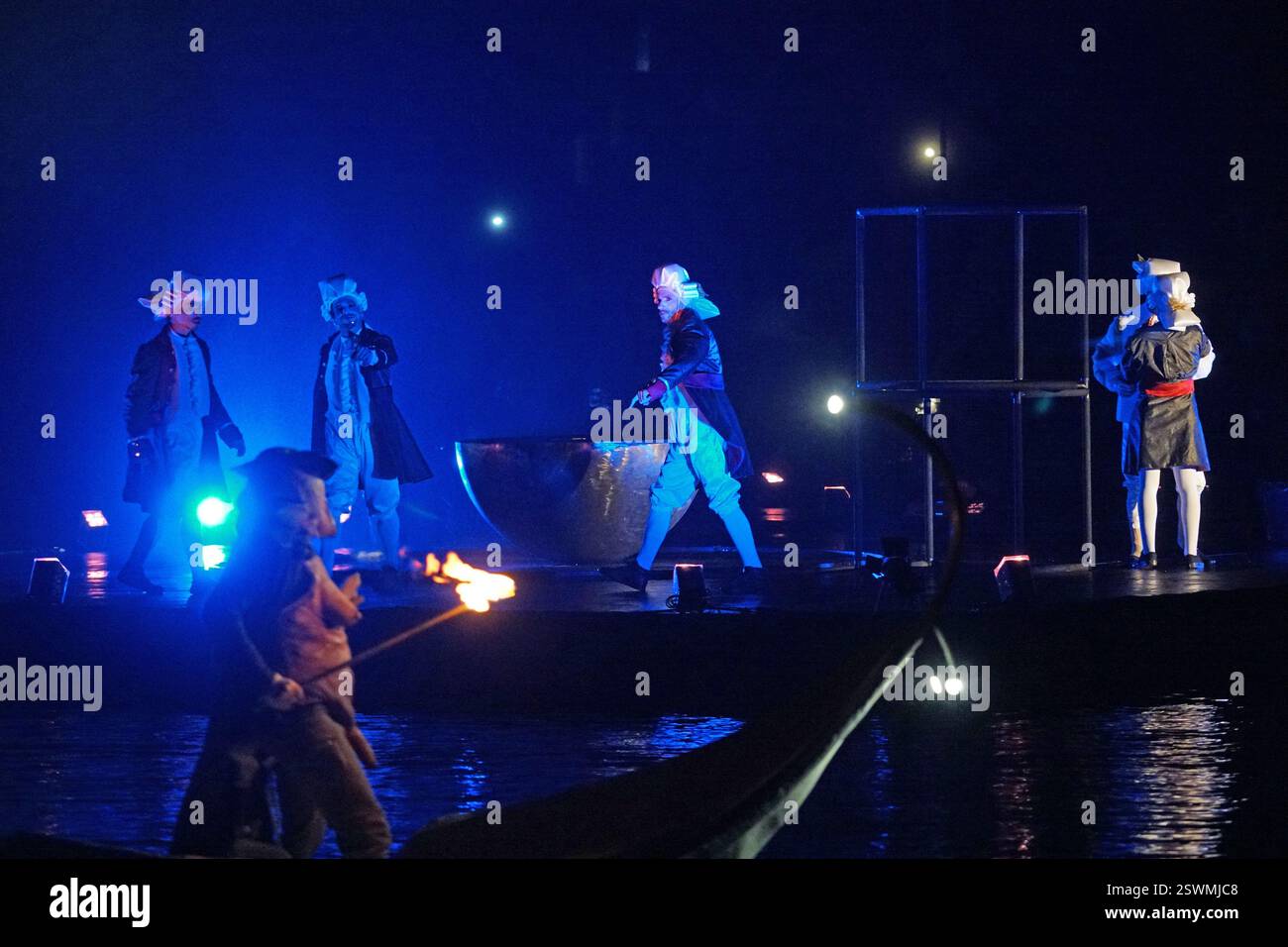 Cast members perform in a show on water titled 'Giacomo. A love story ...