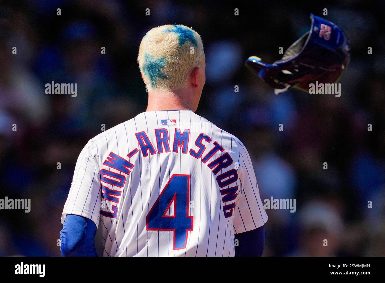 Chicago Cubs' Pete Crow-Armstrong tosses his helmet after striking out ...