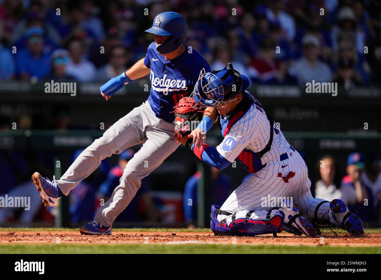 Los Angeles Dodgers' Austin Barnes is tagged out at home by Chicago ...