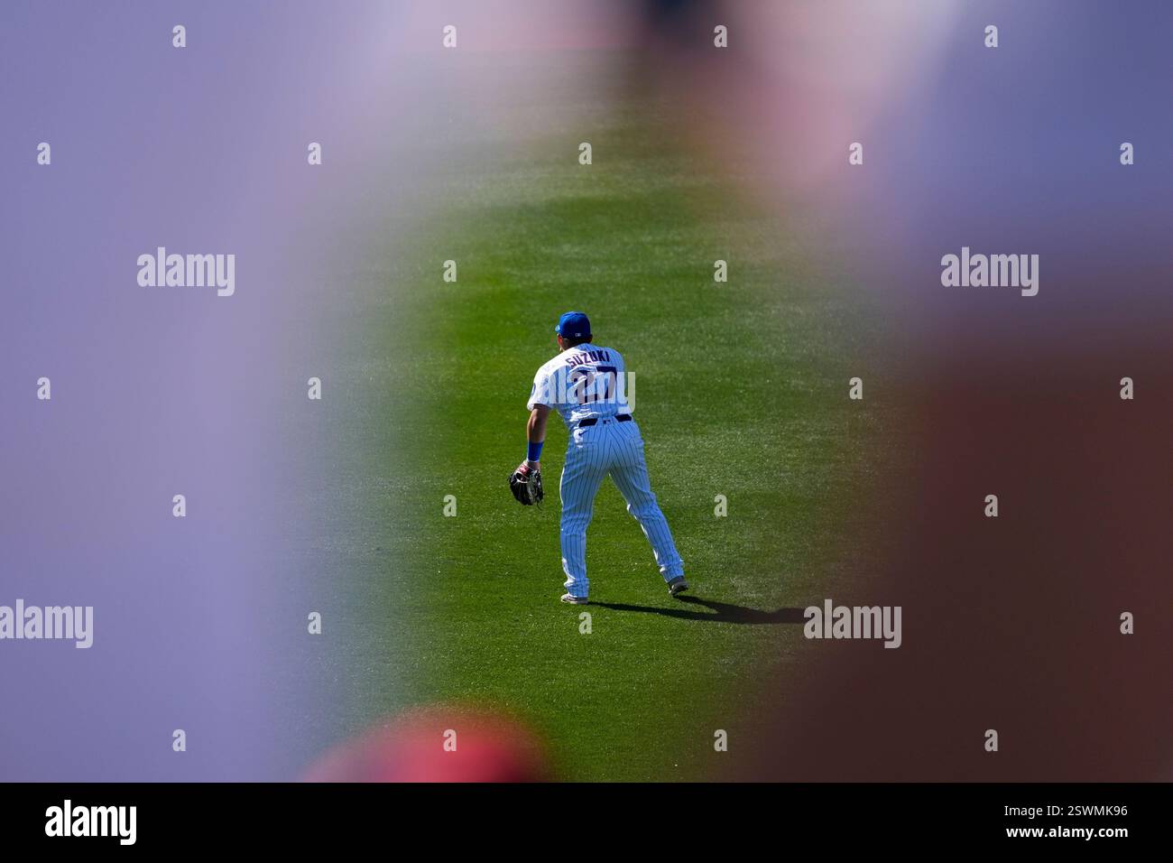 Chicago Cubs right fielder Seiya Suzuki stands in the outfield during ...