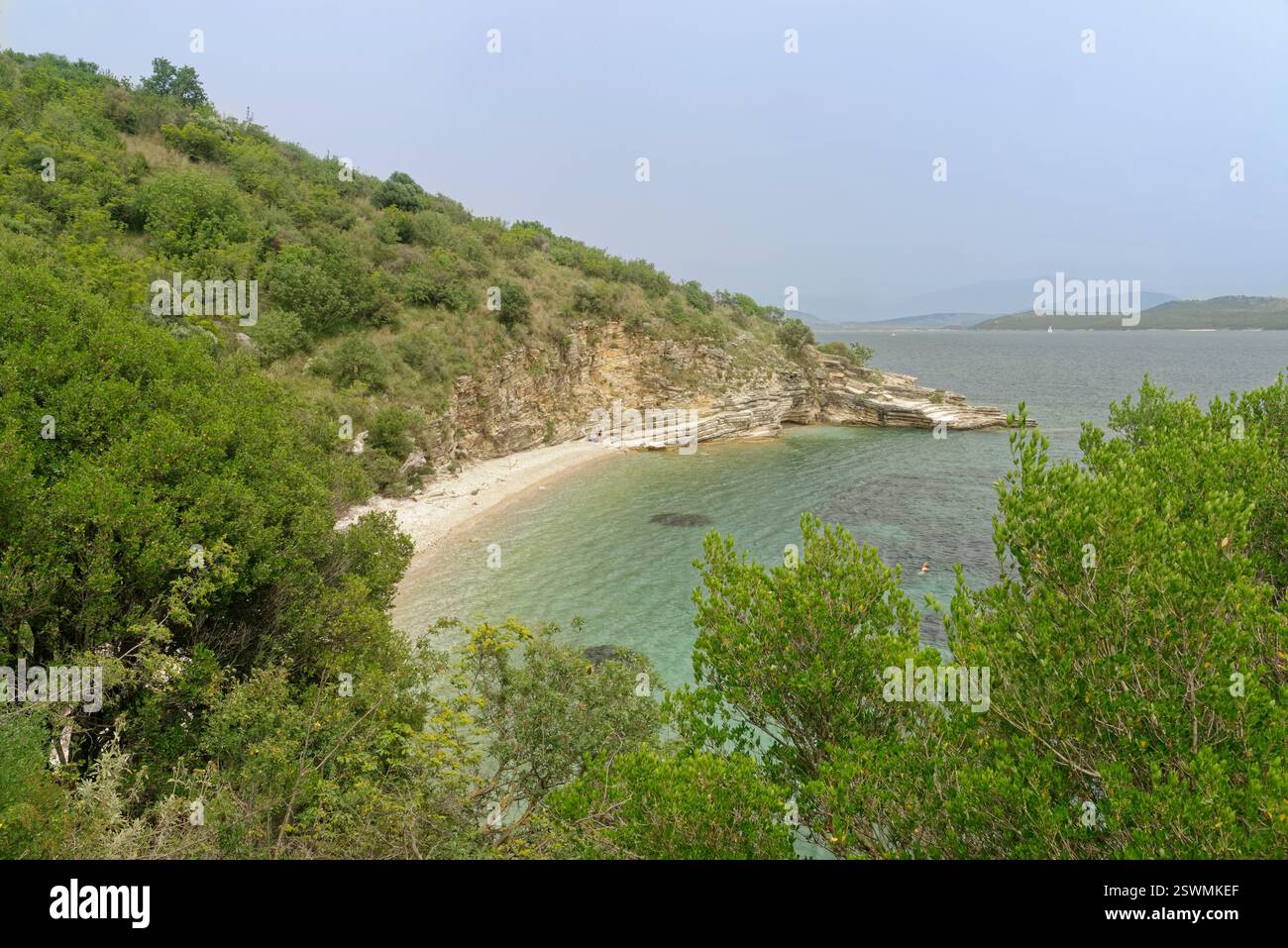 Overview of a remote sandy cove, near Kouloura, Corfu, Greece, May ...