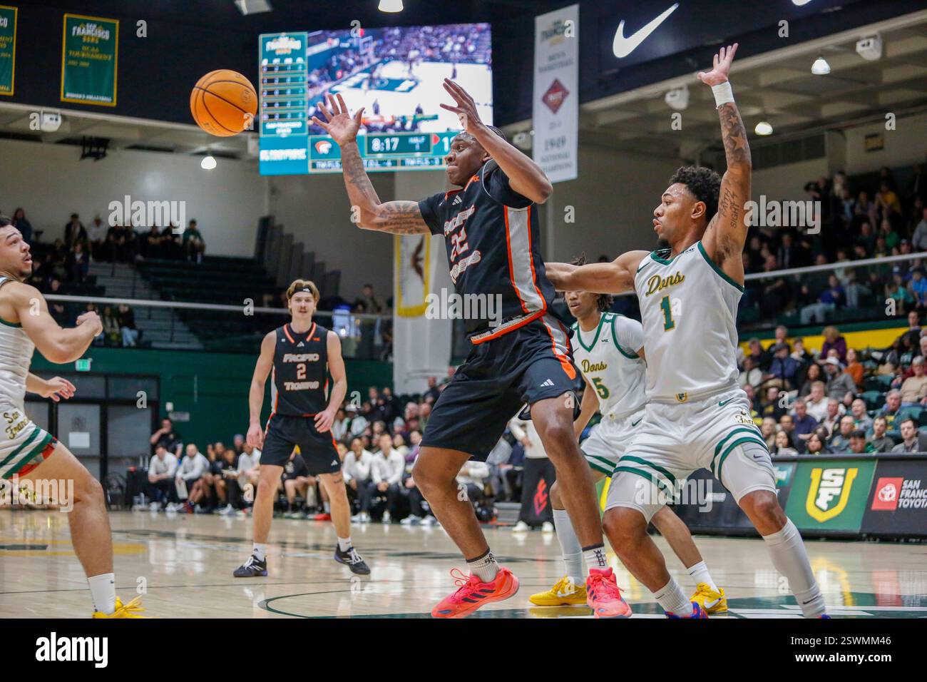 SAN FRANCISCO, CA - FEBRUARY 20: UOP Tigers G Elijah Fisher (22) loses ...