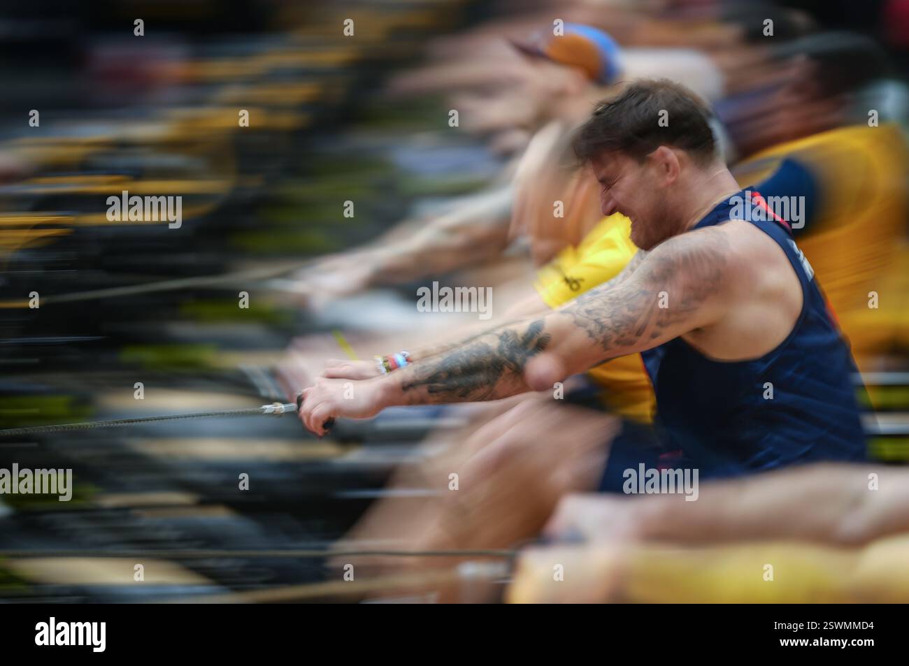 Benjamin Lukowski, of the U.K., competes in the indoor rowing ...