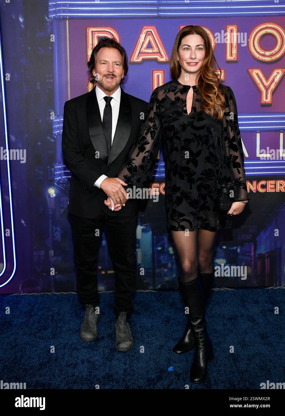 Eddie Vedder, left, and wife Jill Vedder attend the SNL50: The Homecoming Concert at Radio City ...