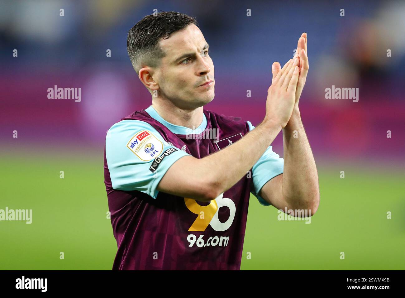 Burnley, UK. 21st Feb, 2025. Connor Roberts of Burnley applauds the ...