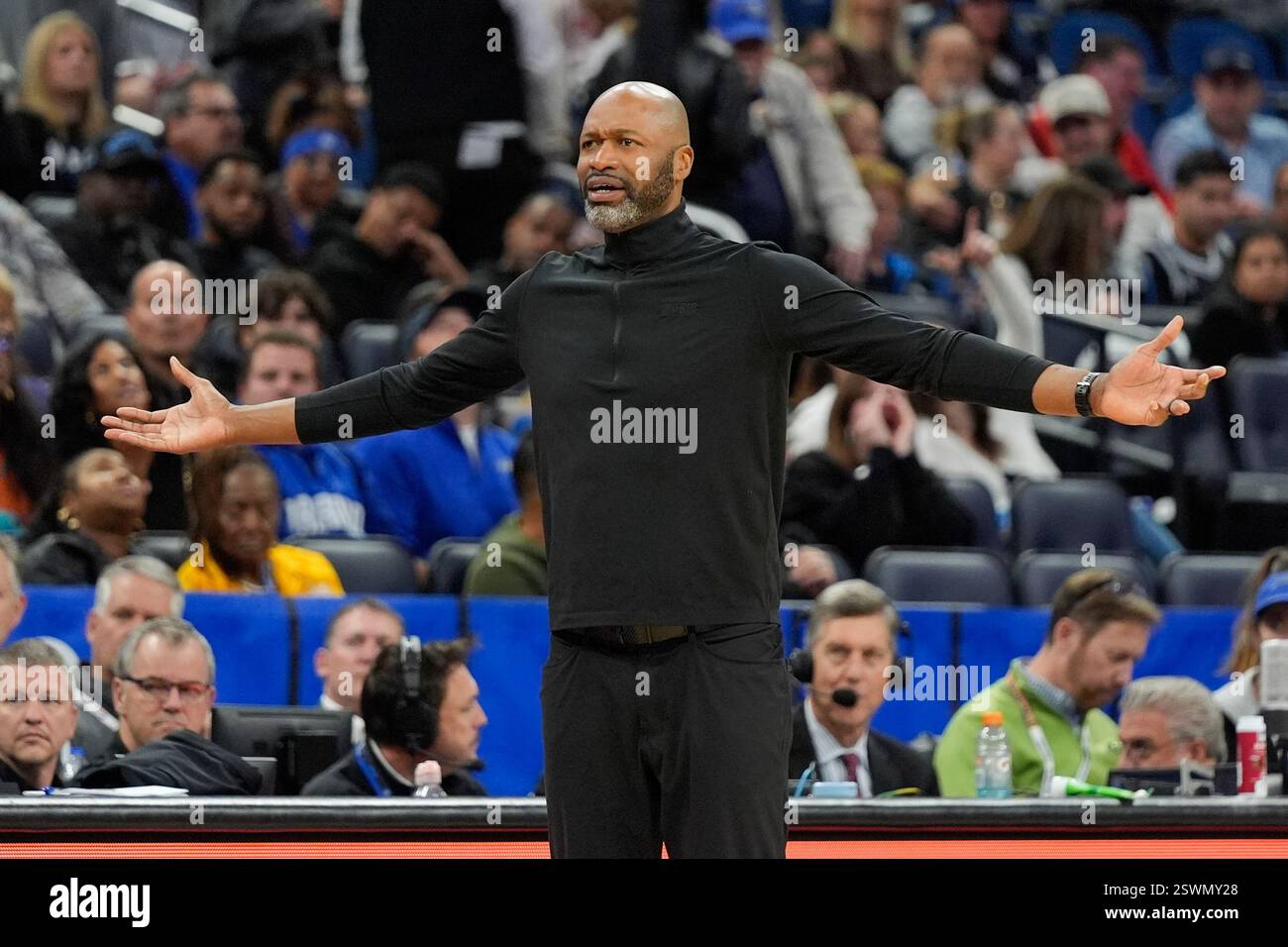 Orlando Magic head coach Jamahl Mosley questions a call by officials ...