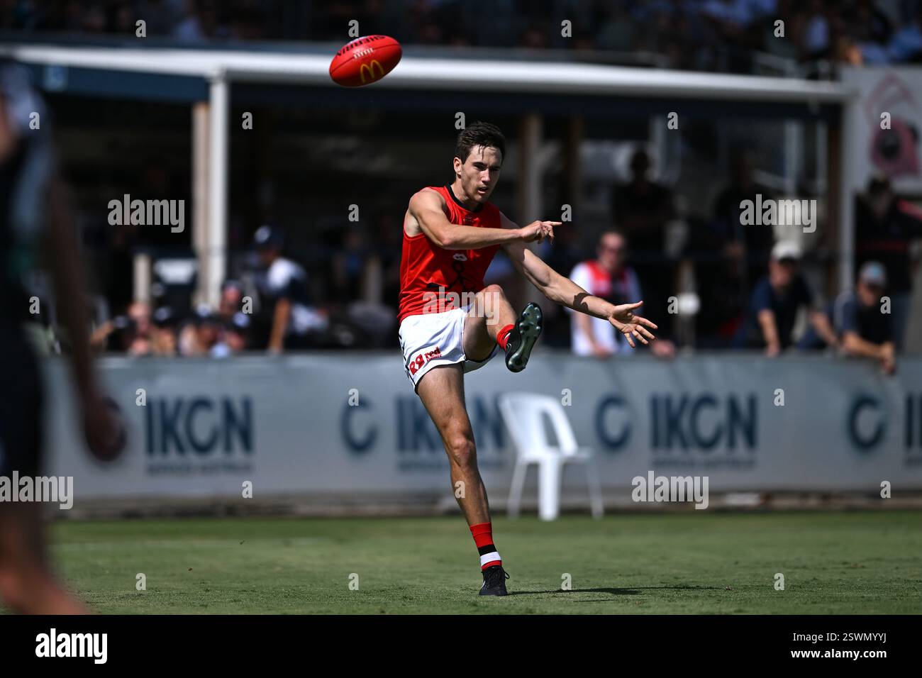 Cooper Sharman of St Kilda kicks a goal during the AFL match simulation ...