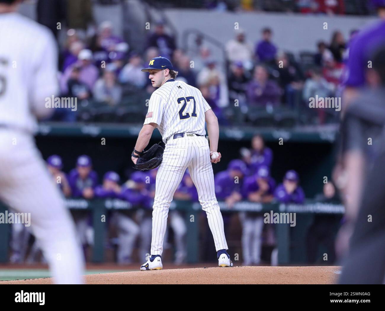 February 21, 2025, Arlington, Texas, USA: Michigan pitcher DYLAN VIGUE ...