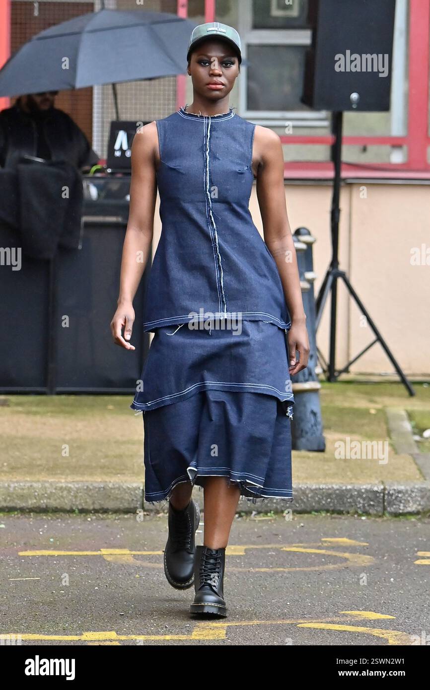 London, UK. 21st Feb, 2025. A model is seen on the runway during the ...