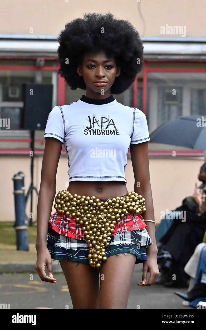 London, UK. 21st Feb, 2025. A model is seen on the runway during the ...
