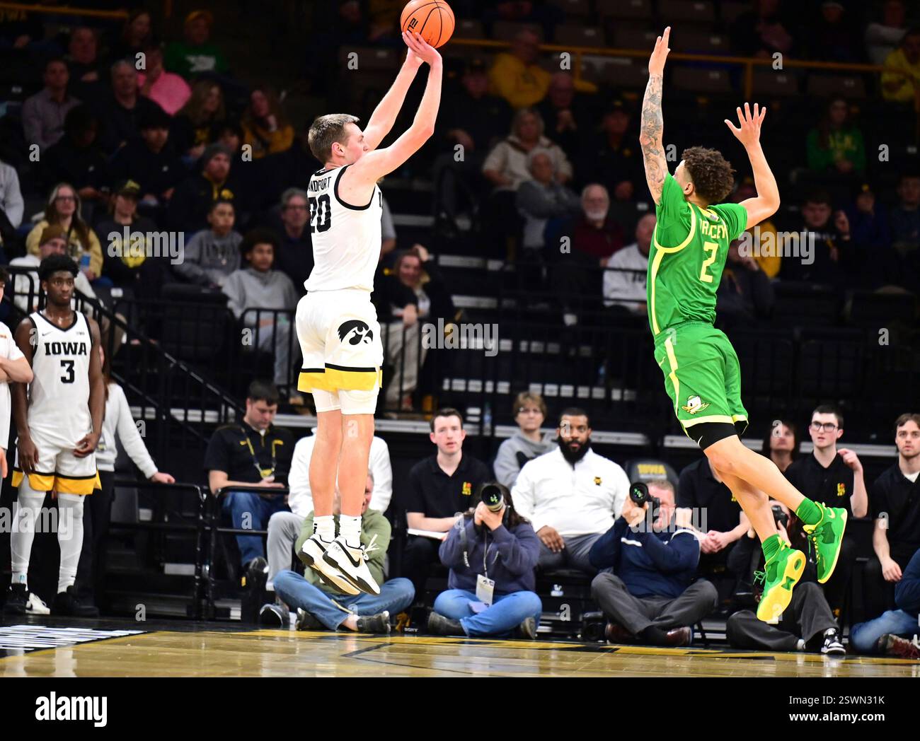 IOWA CITY, IA - FEBRUARY 19: Iowa forward Payton Sandfort (20) attempts ...